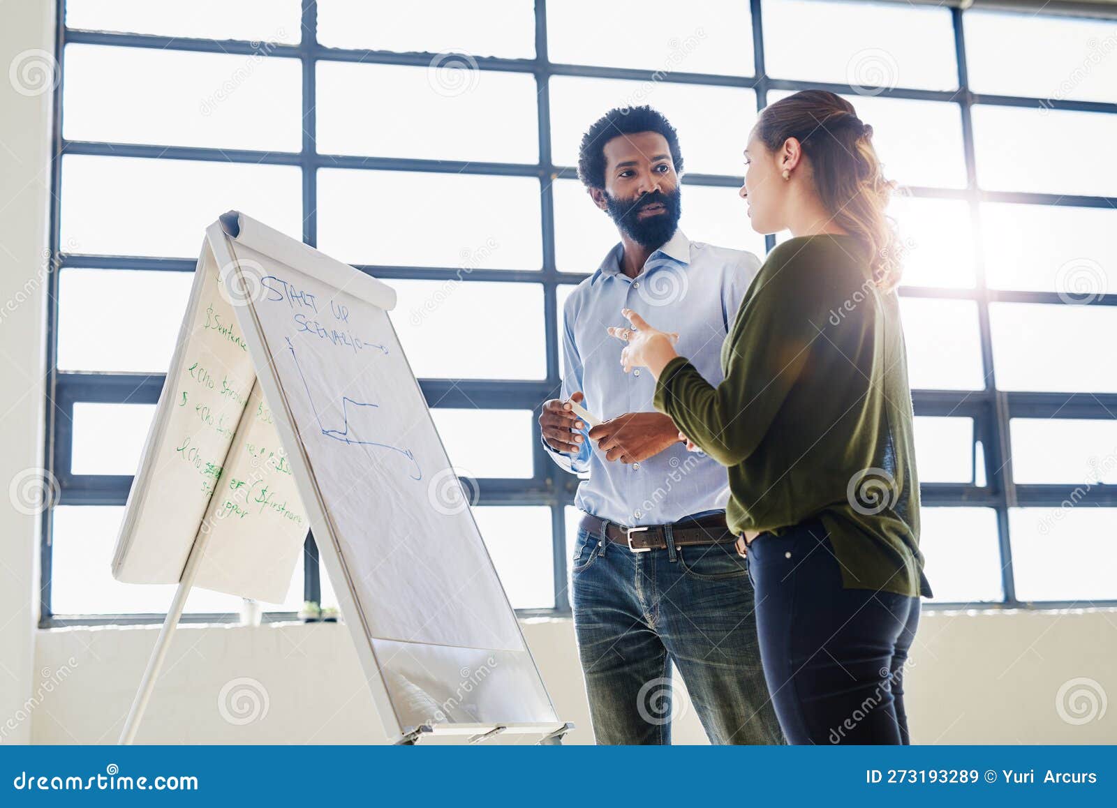 Getting Her Thoughts. Two Businesspeople Brainstorming Together in an ...