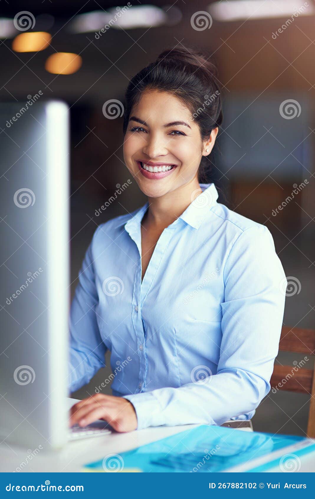 Getting Her Work Done with a Smile. Portrait of a Young Businesswoman ...