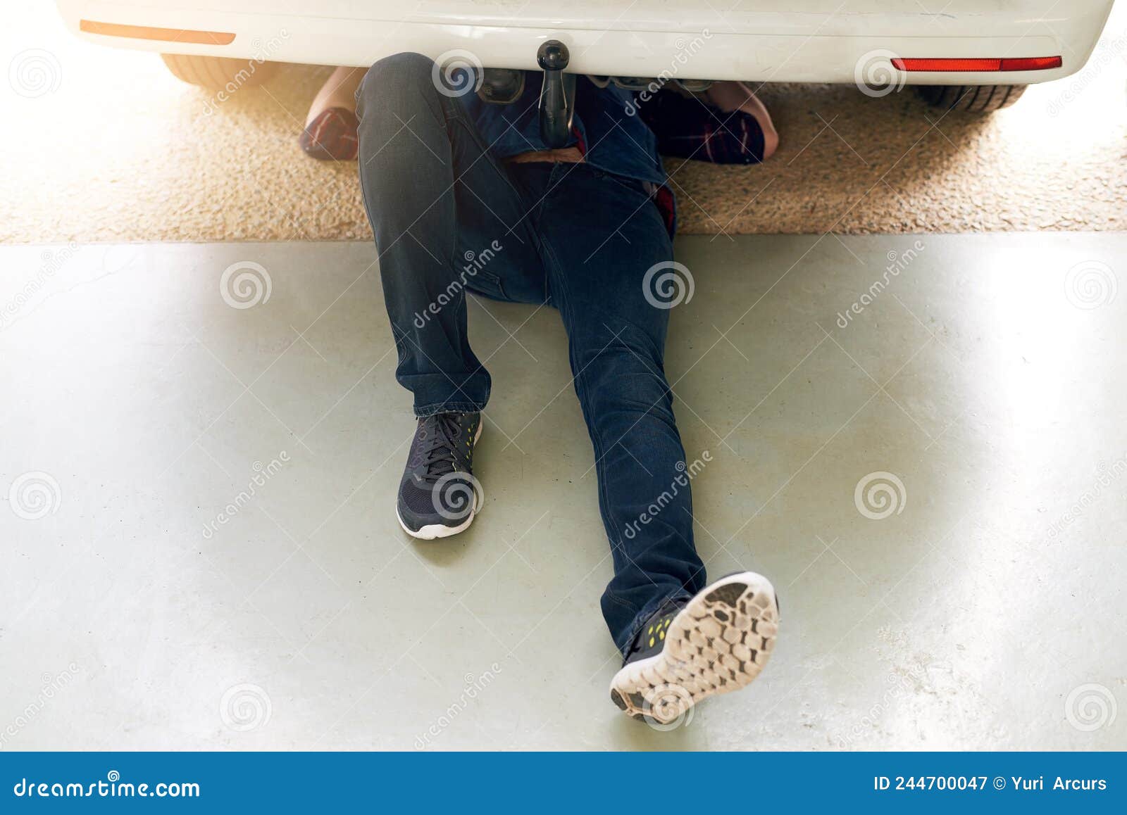 Getting His Car Back on the Road. High Angle Shot of an Unrecognizable ...