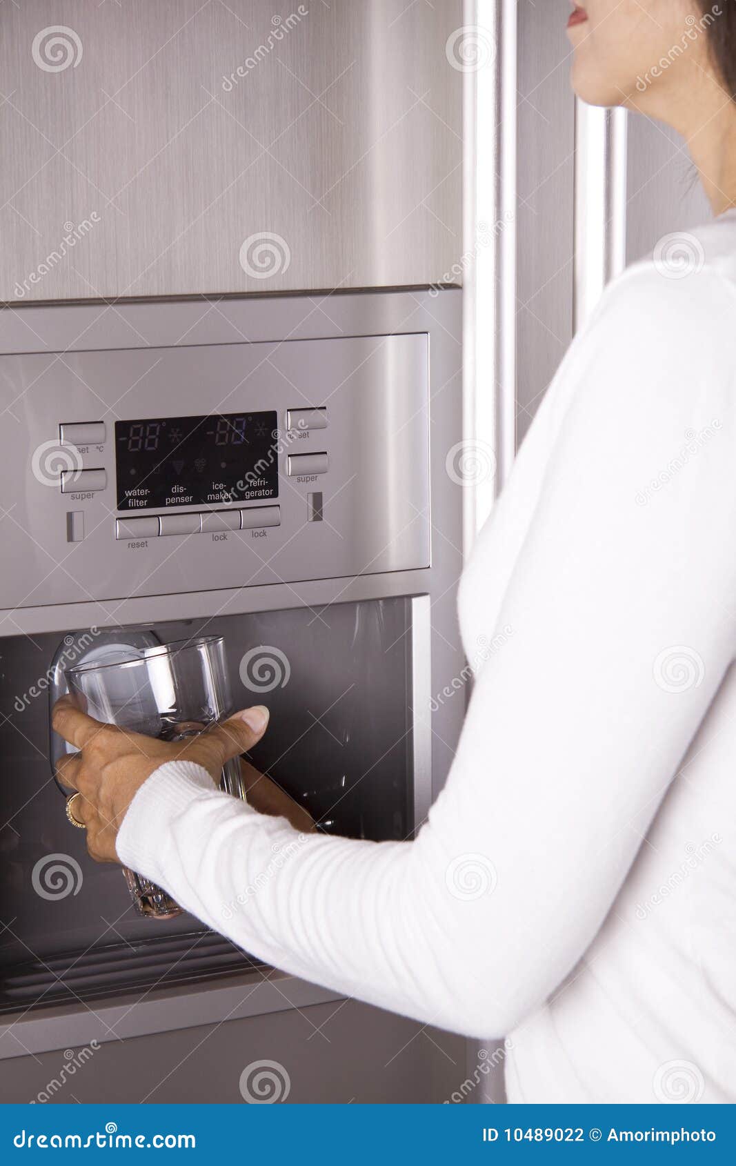 Getting Ice from the Refrigerator Stock Photo - Image of steel, cubes ...