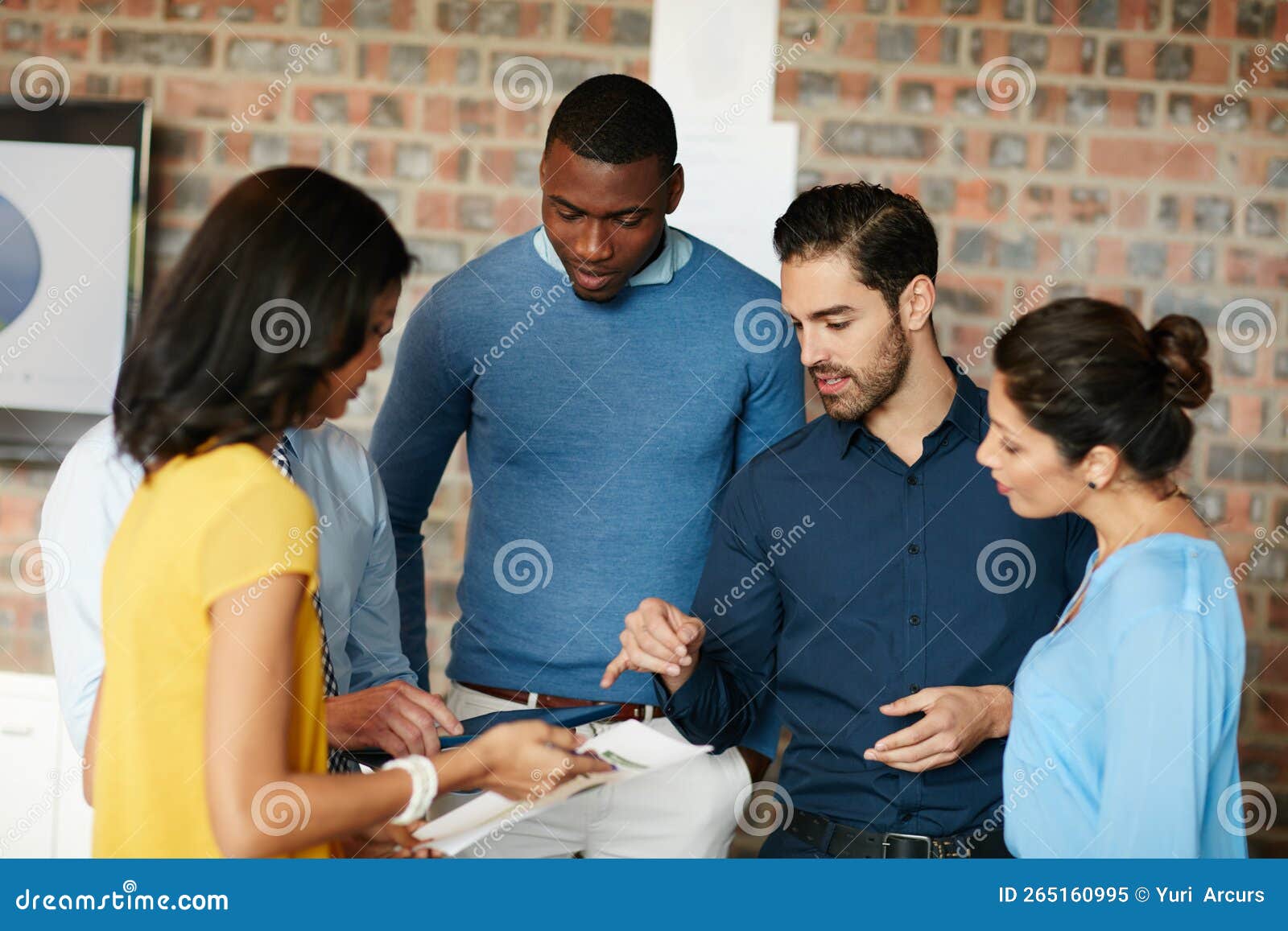 Getting the Job Done with a Little Teamwork. a Group of Businesspeople ...