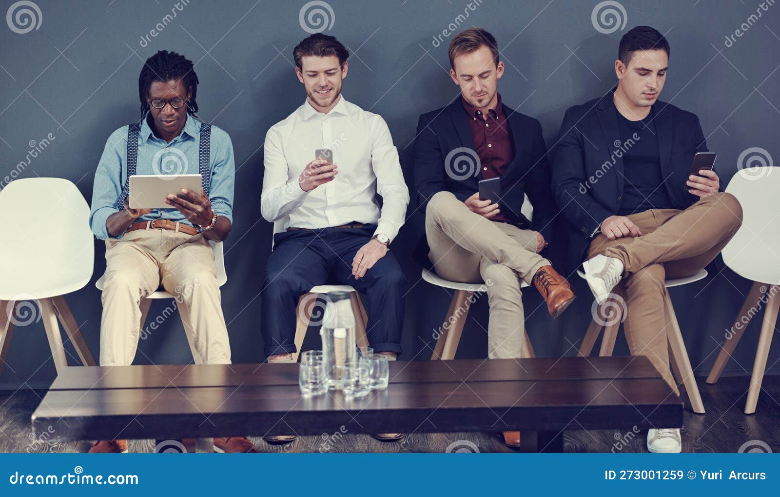 Getting Last Minute Tips for the Interview. a Group of Businessmen ...