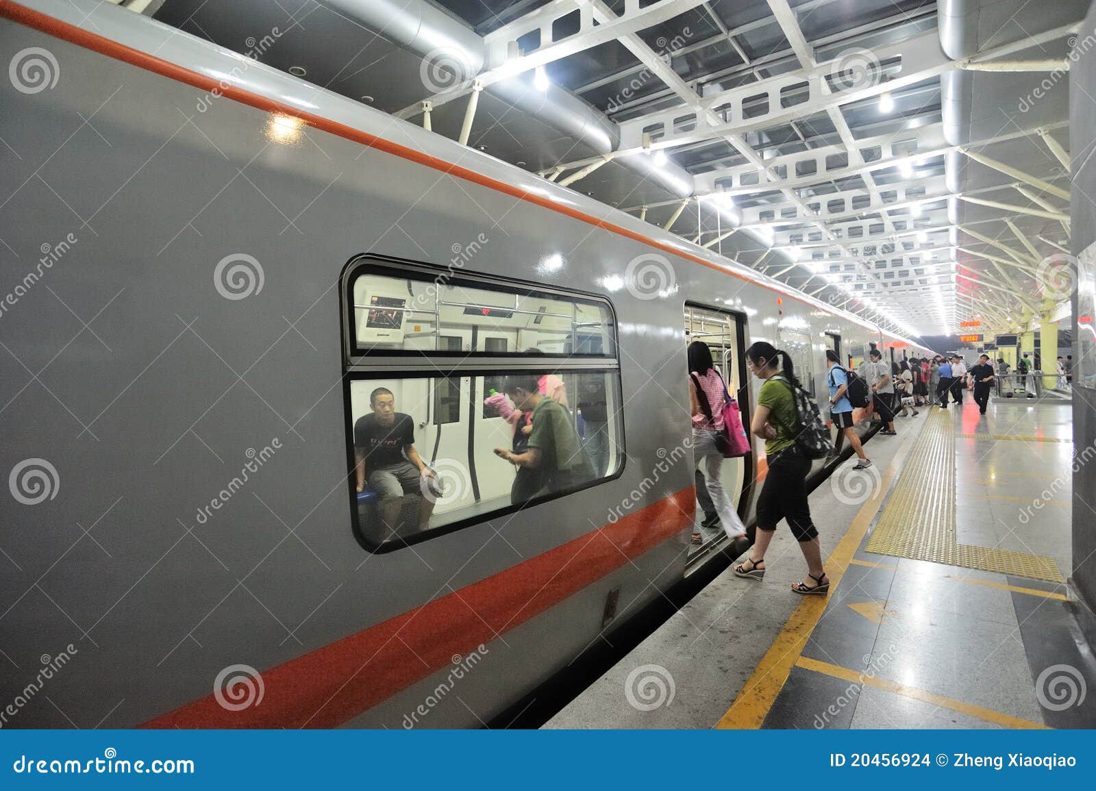 Getting on the Metro editorial stock image. Image of evening - 20456924
