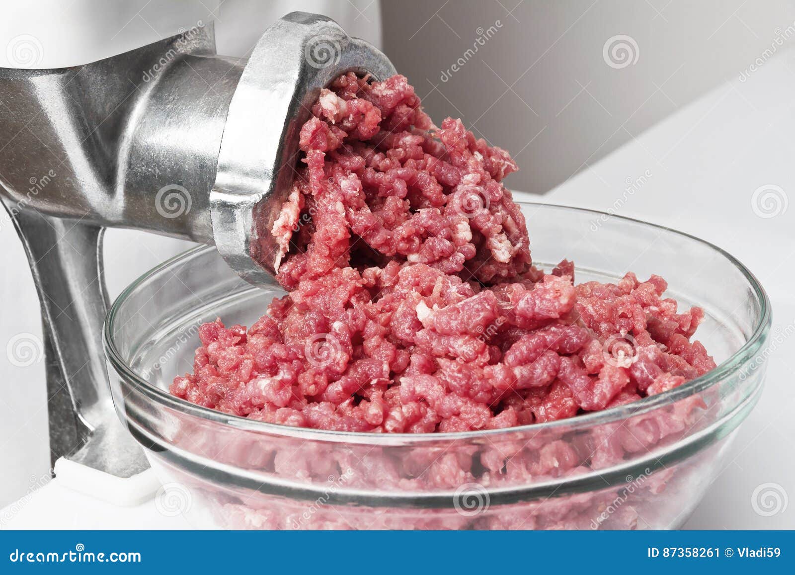 Getting Minced Using a Meat Grinder Stock Image - Image of iron, bowl ...