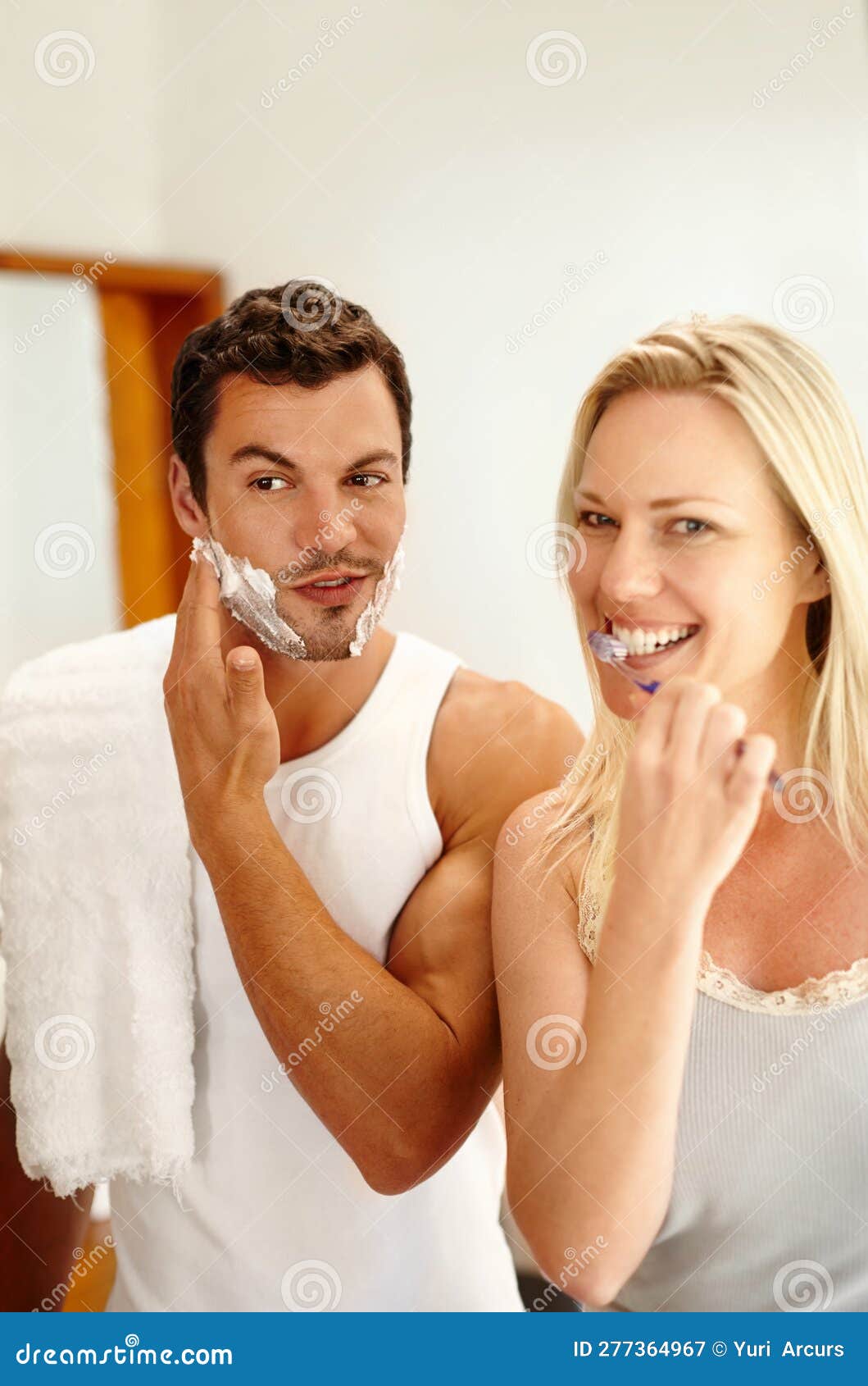 Getting Ready for the Day Ahead. a Couple Getting Ready for the Day ...