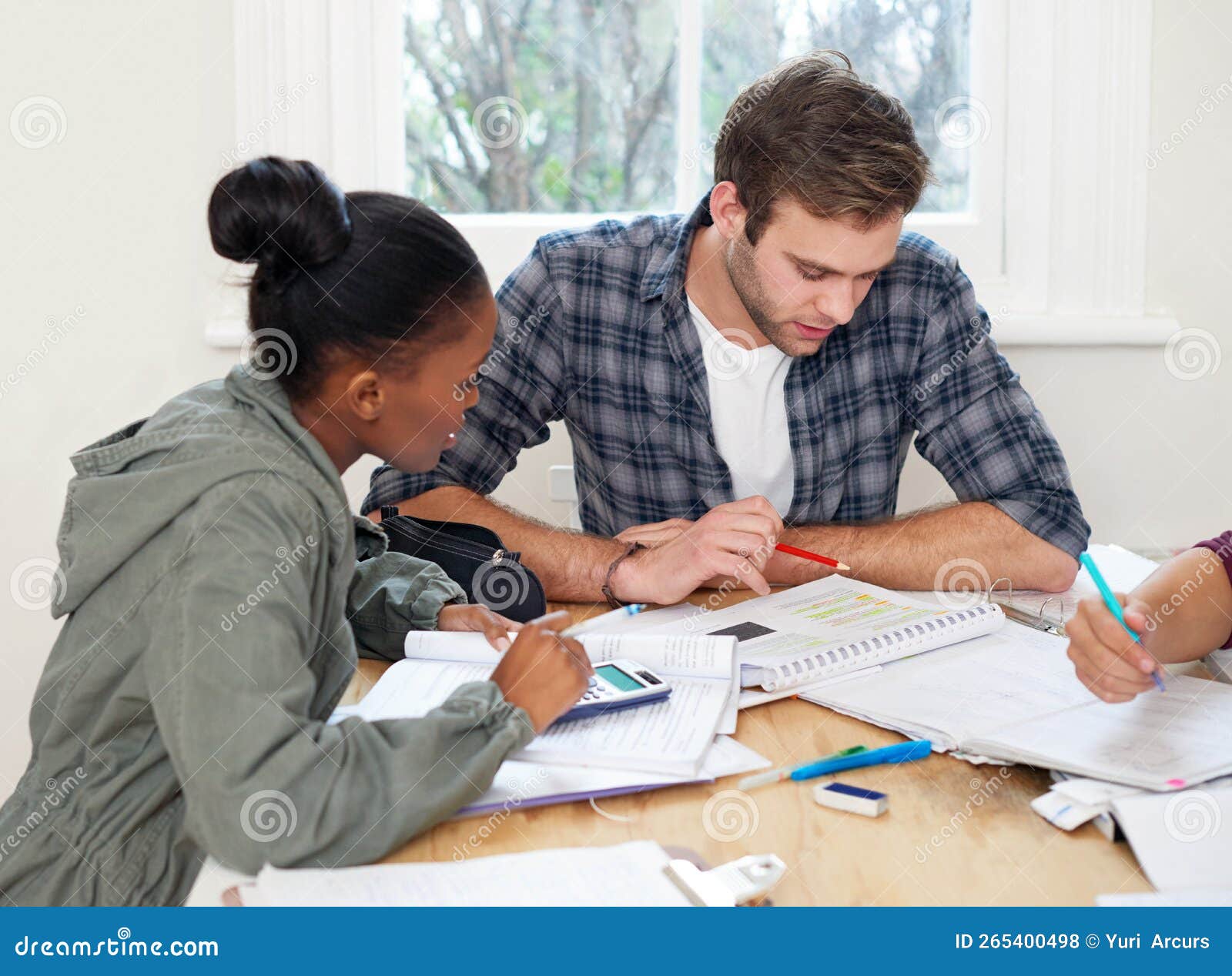 Getting Ready for Finals. Three University Students Studying. Stock ...