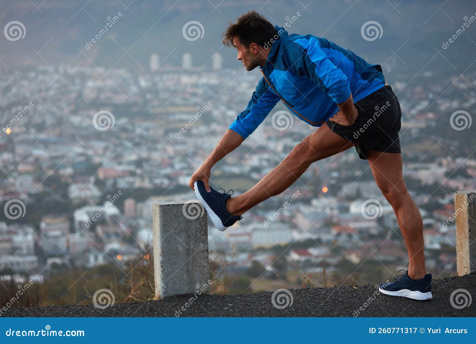 Getting Ready To Conquer the City. a Young Athletes Exercising Outdoors ...