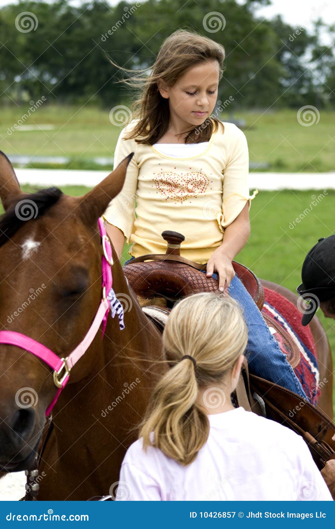 Getting Ready to Ride stock image. Image of girl, bridle - 10426857