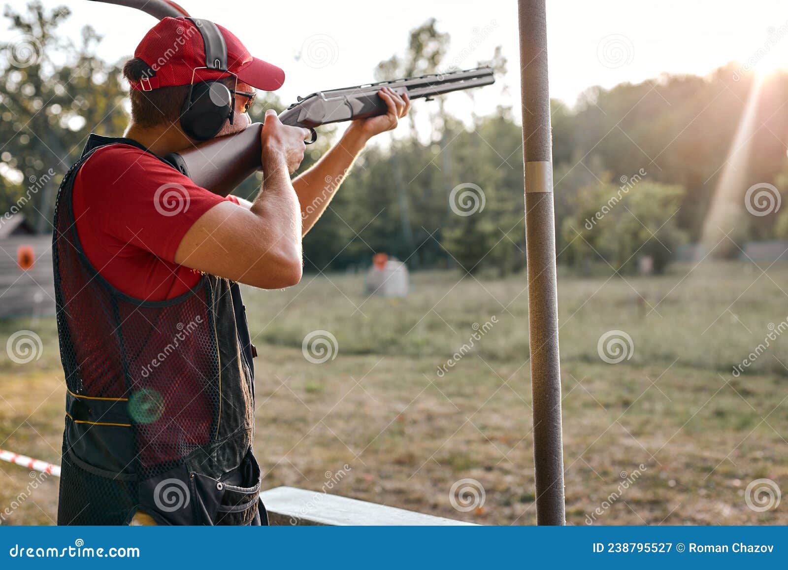 After Getting Shooting Instructions, Young Man Concentrated at Aiming ...