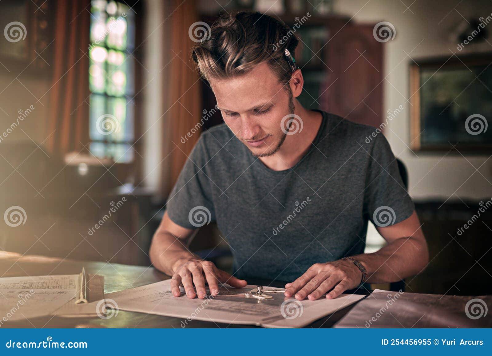 Getting Smarter by the Minute. a Diligent Young Student Doing a ...