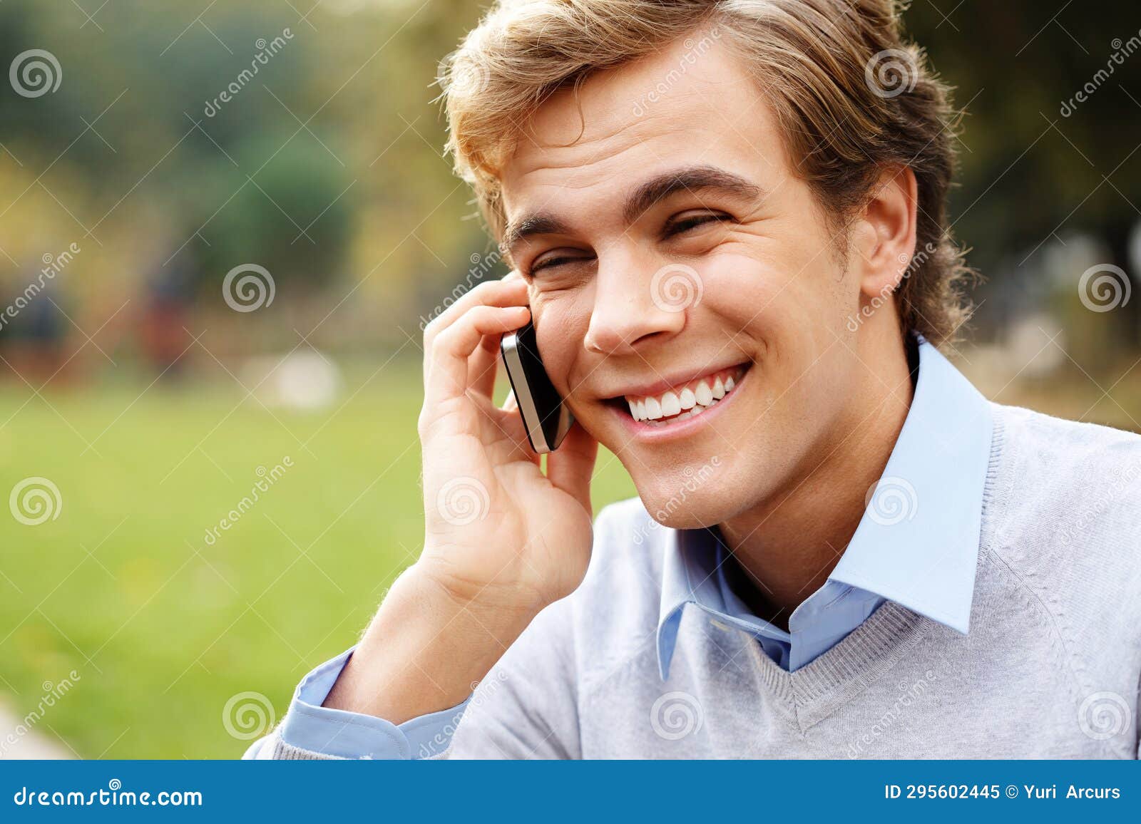 Getting Some Fresh Air. a Young Man Using His Smartphone To Make a Call ...