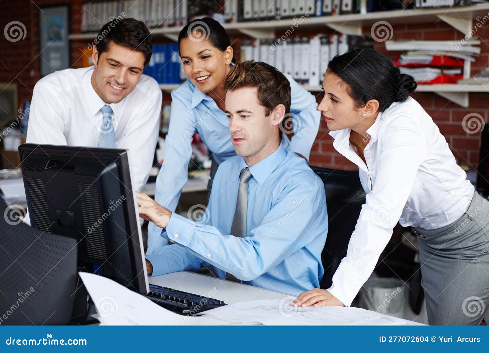 Getting Some Help from His Colleagues. a Young Business Team ...