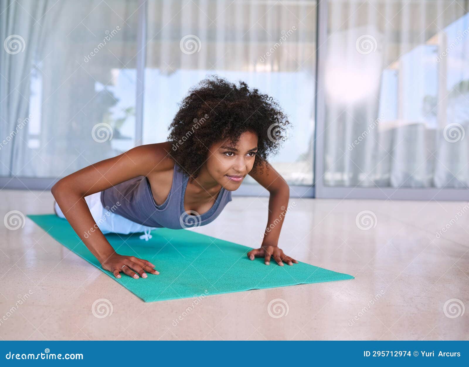 Getting Stronger with Each Rep. an Attractive Young Woman Doing Push ...