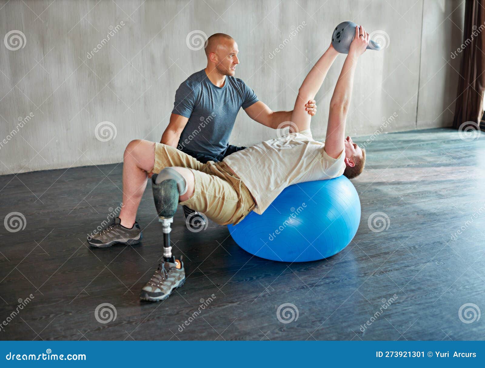 Getting Stronger One Session at a Time. Studio Shot of a Young Amputee ...