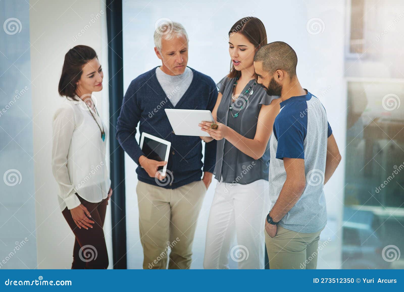 Getting the Team To Take a Look. a Group of Colleagues Having a ...