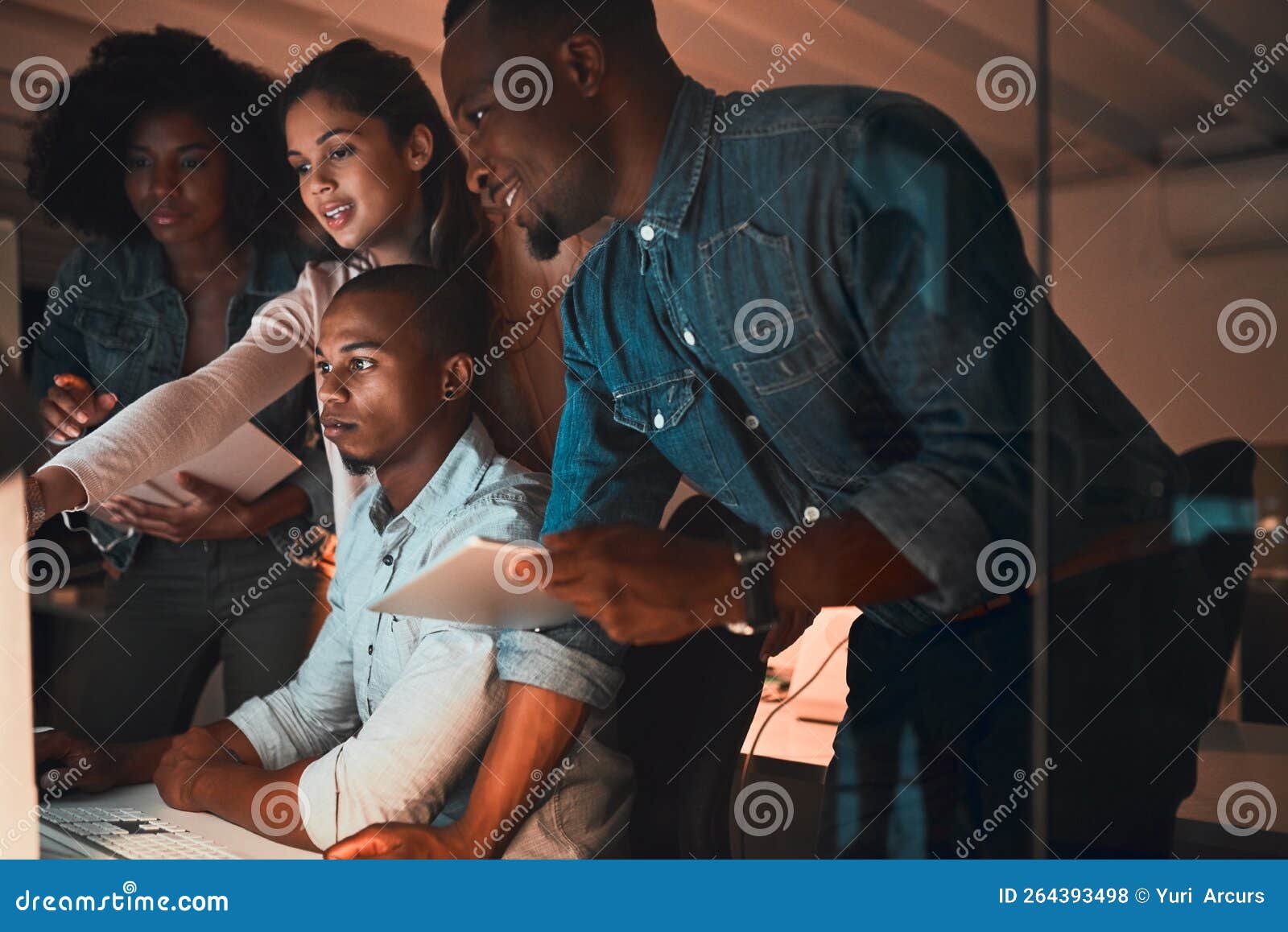 Getting the Teams Input. a Group of Young Designers Working Together on ...