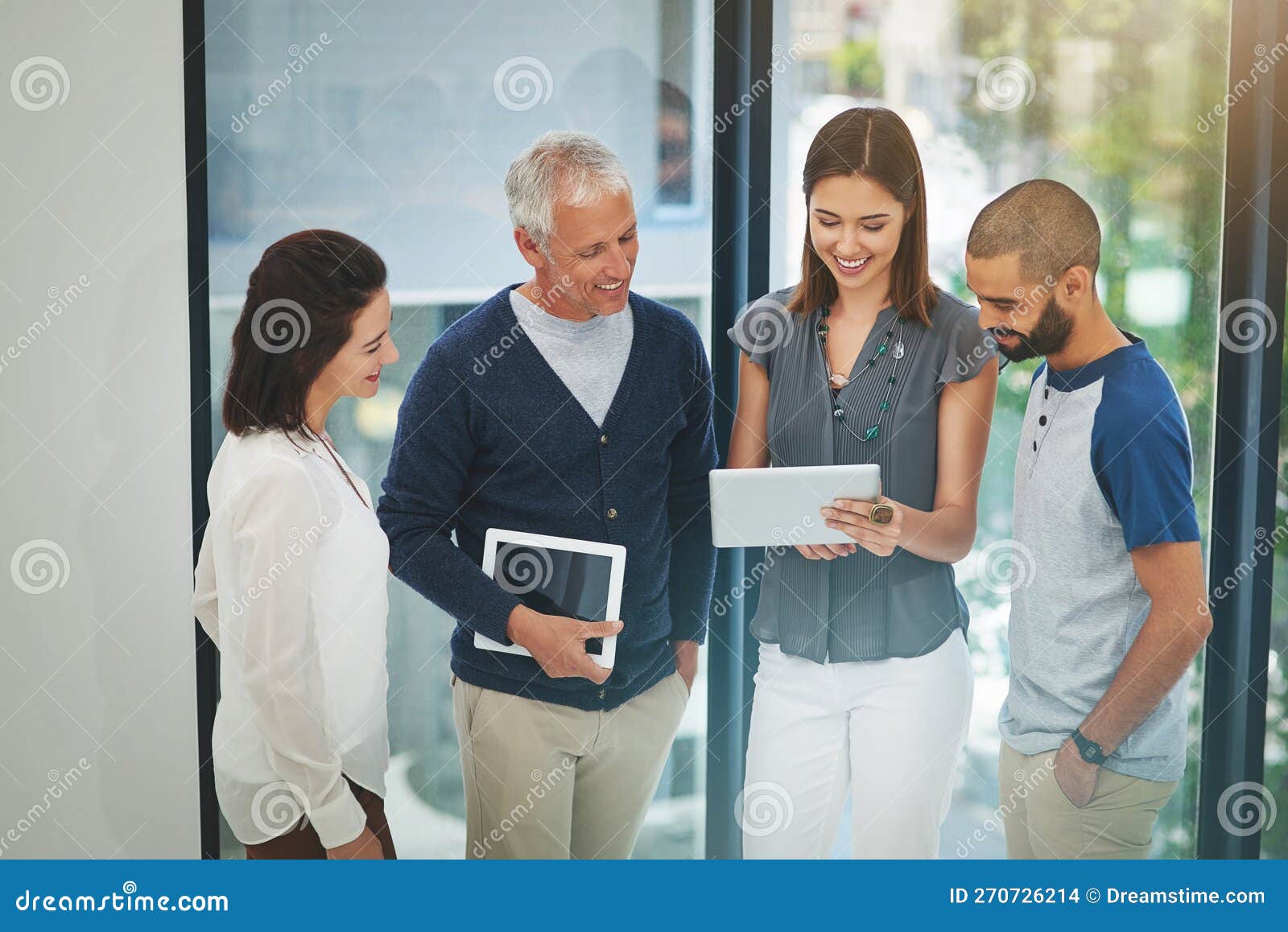 Getting the Teams Thoughts. a Group of Colleagues Having a Conversation ...
