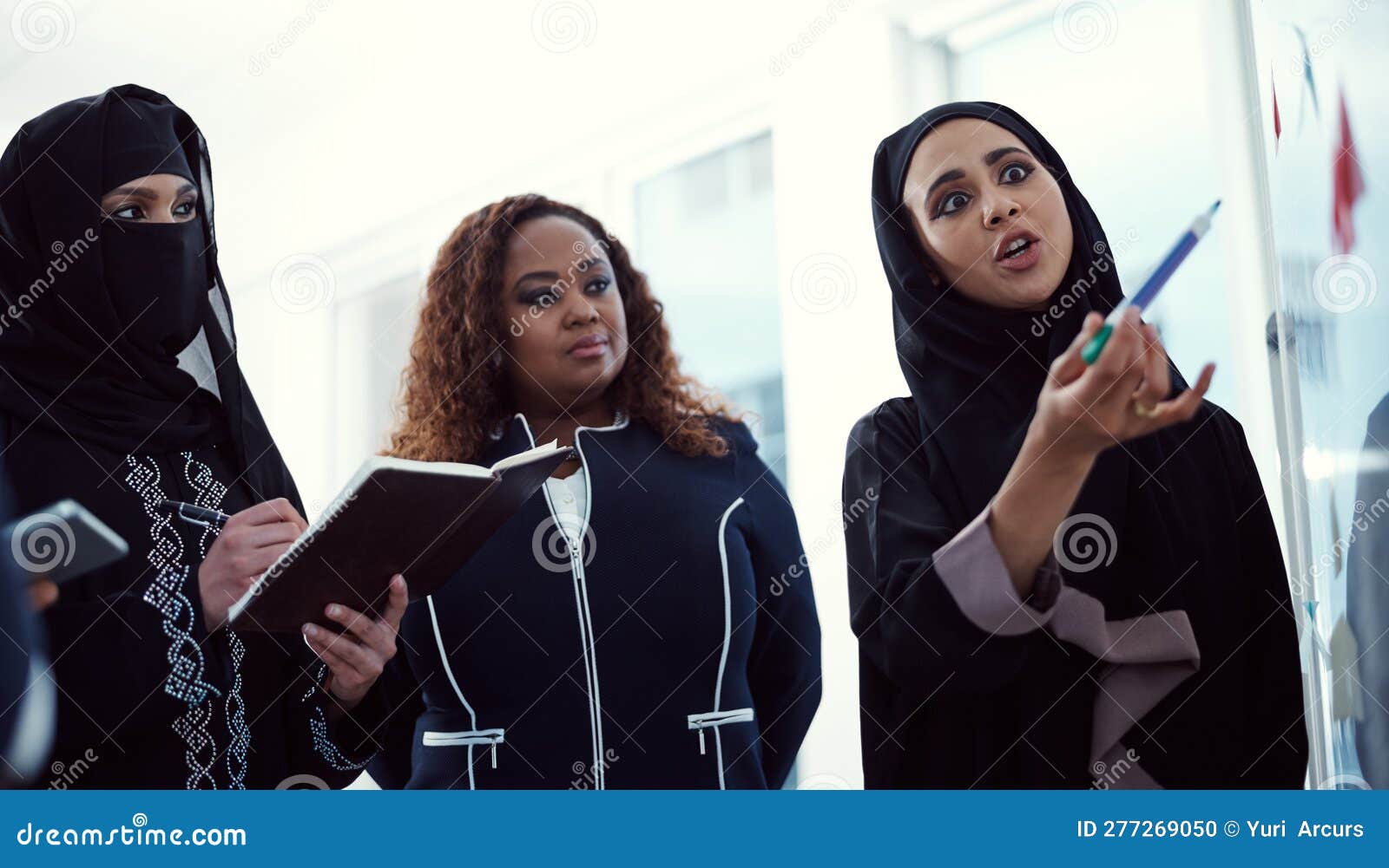Getting Their Input. Low Angle Shot of a Group of Diverse Business ...