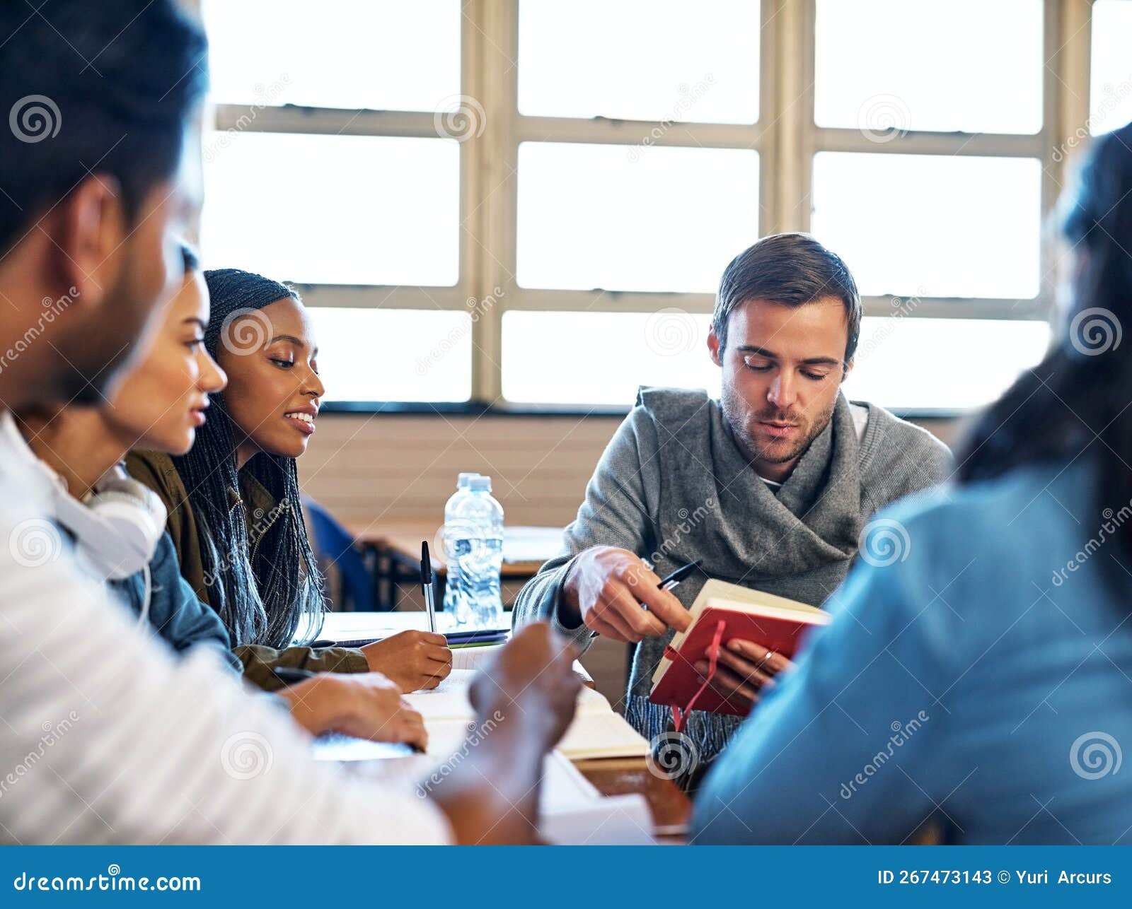 Getting Their Learn on. a Group of Young University Students Working ...