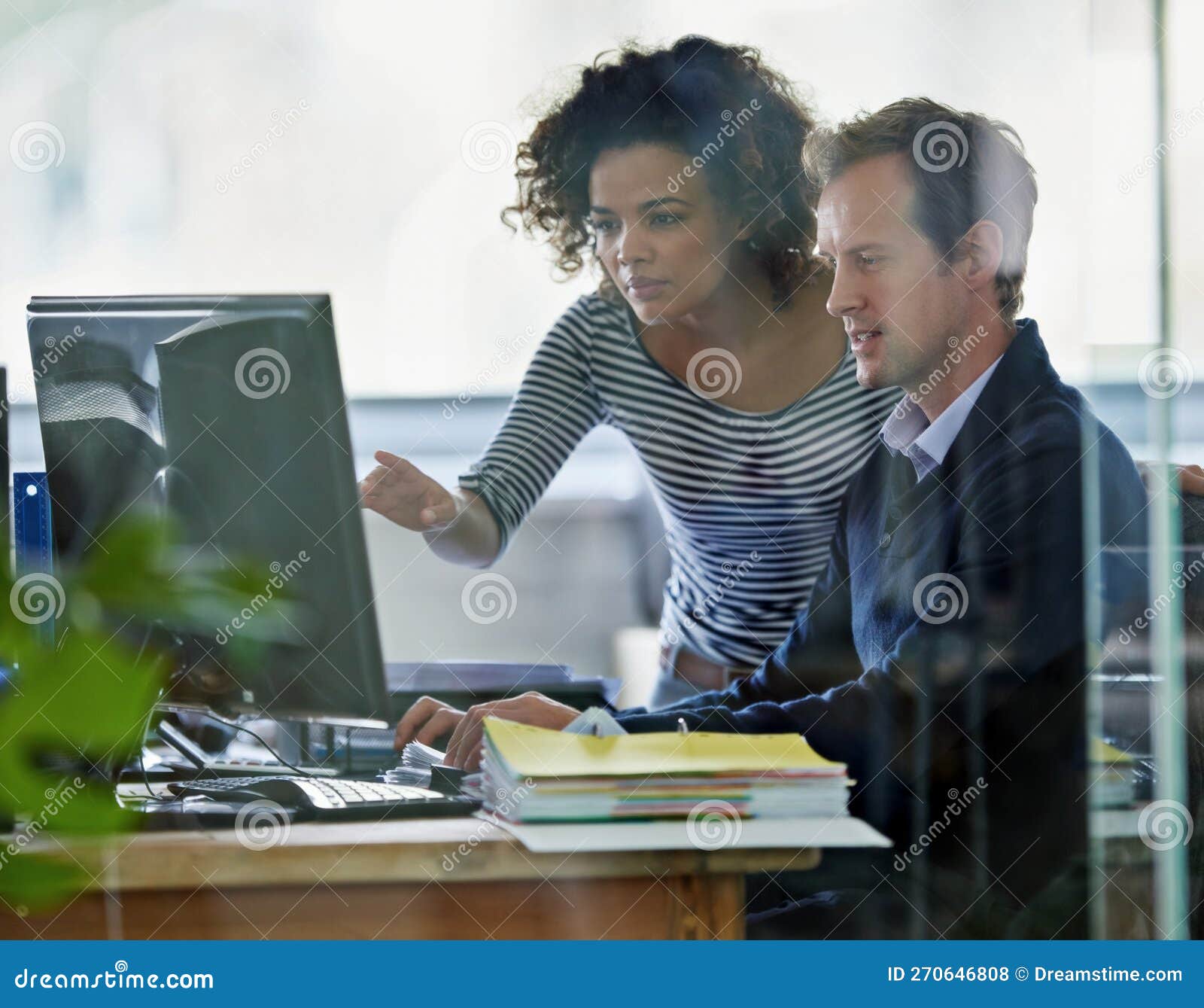 Getting Their Work Done. Cropped Shot of Two Young Designers Working on ...