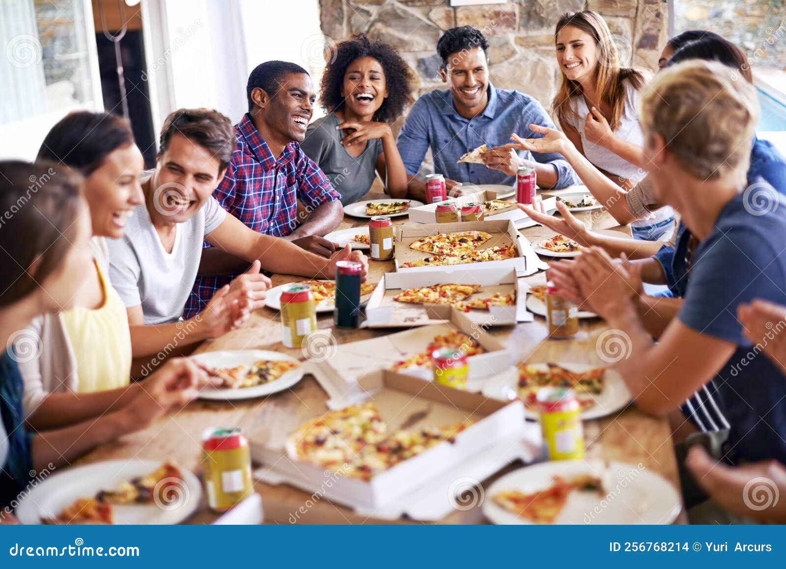 Getting Together for Pizza. a Group of Friends Enjoying Pizza Together ...