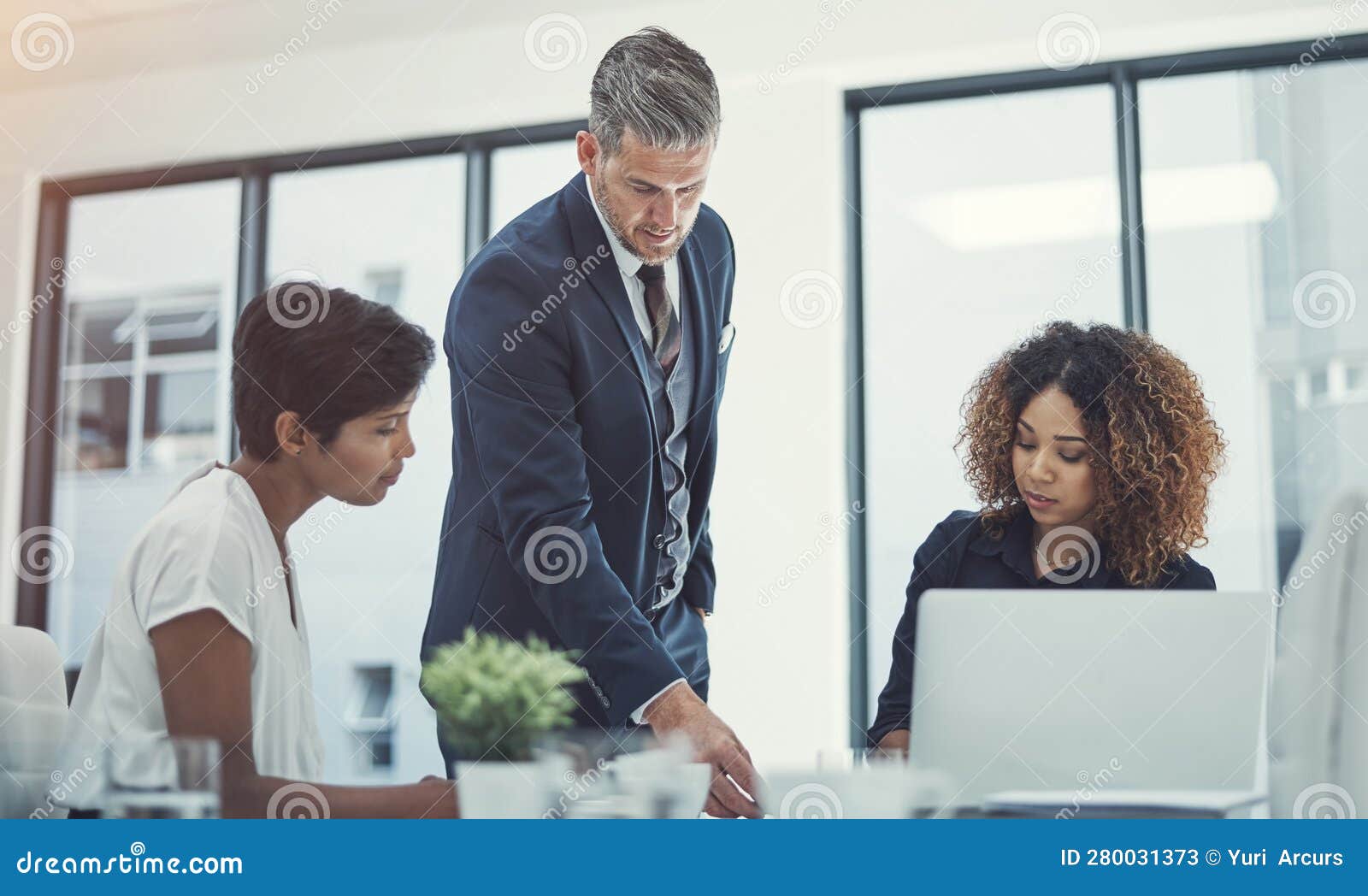 Getting the Work Done As a Team. a Group of Businesspeople Having a ...