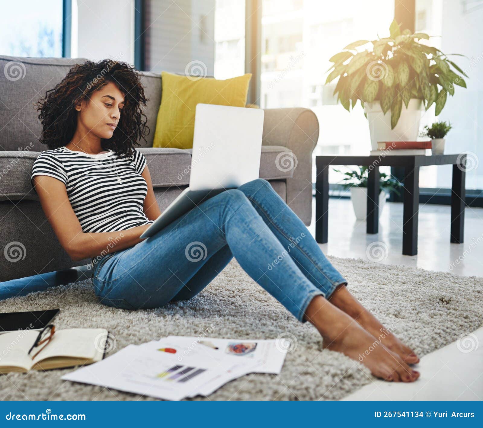 Getting Work Done at Home. a Young Woman Working from Home. Stock Photo ...
