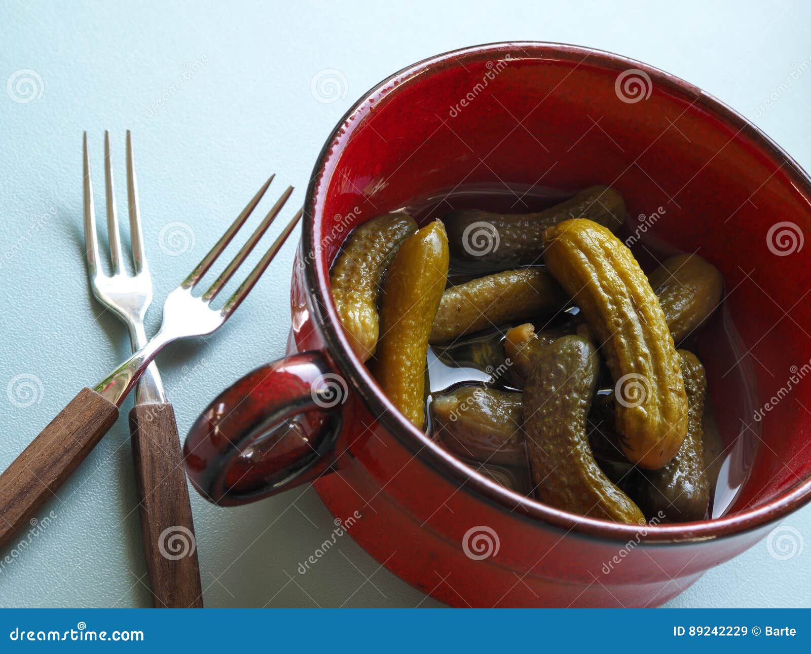 Gherkins in a red bowl stock image. Image of green, food - 89242229