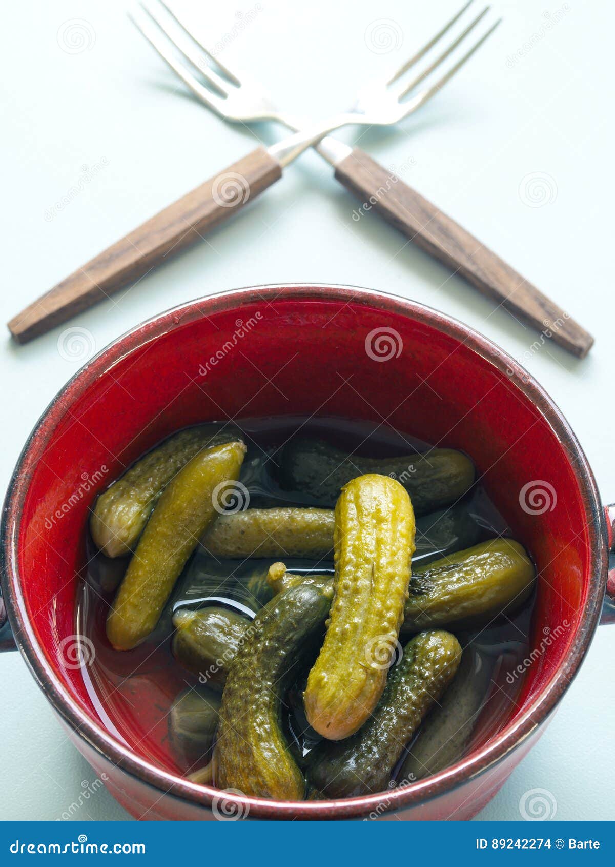 Gherkins in a red bowl stock photo. Image of organic - 89242274