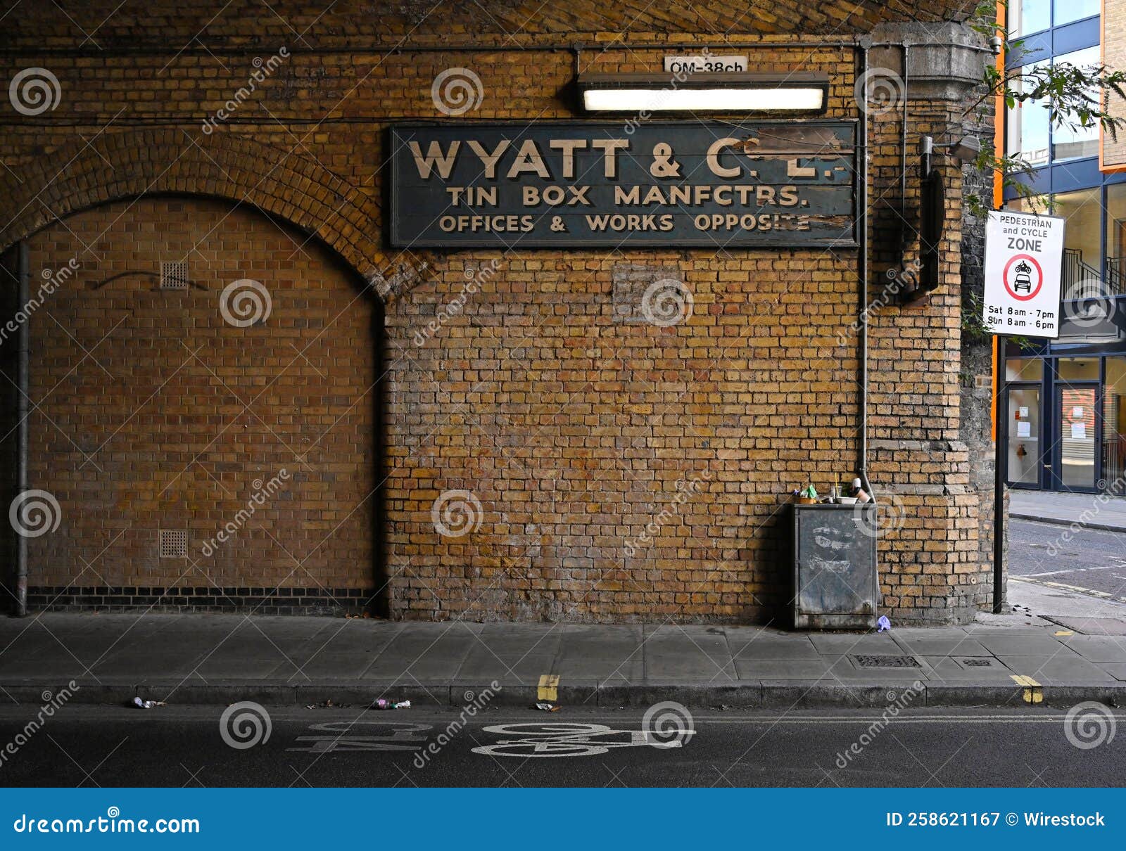 Ghost Sign of a Closed Tin Box Manufacturer on a Brick Wall Editorial ...