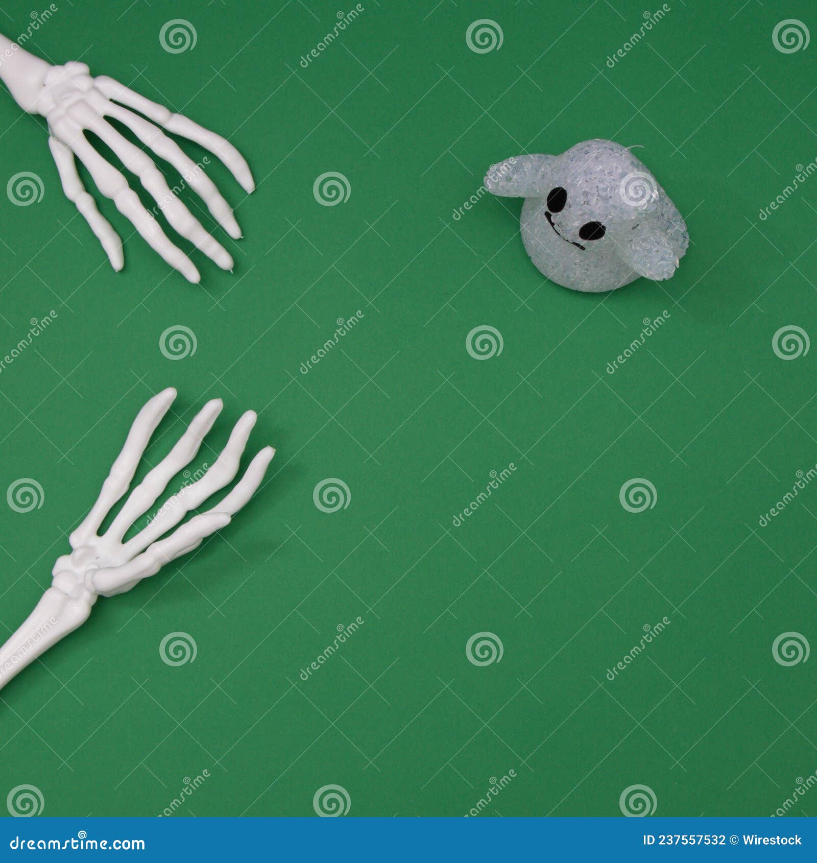 Ghost and Skeleton Hands on a Green Background with Copy Space Stock ...