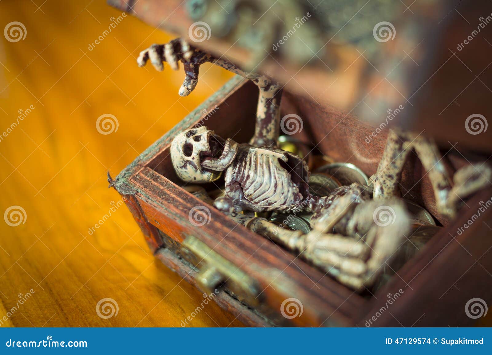 Ghost In The Treasure Chest With Compass On Old Wood Background Stock ...