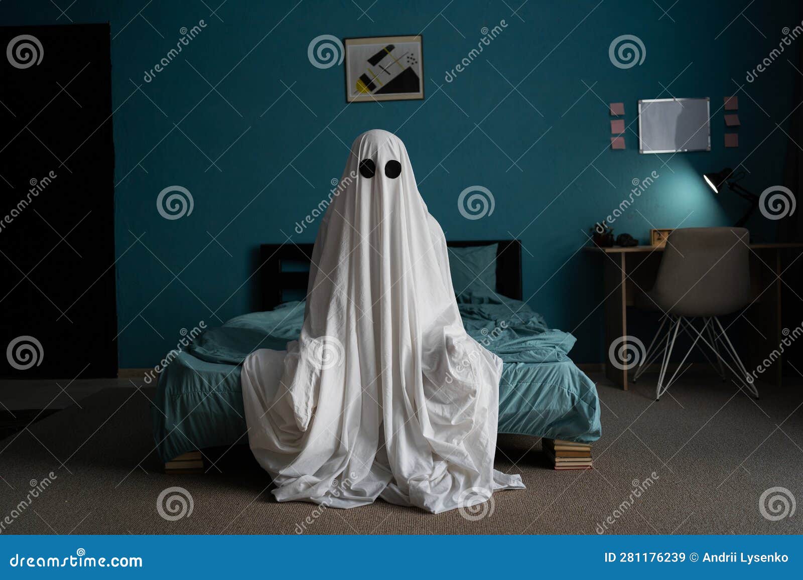 Ghost in White Sheet Sits on Bed in Bedroom at Night. Horror Scene ...