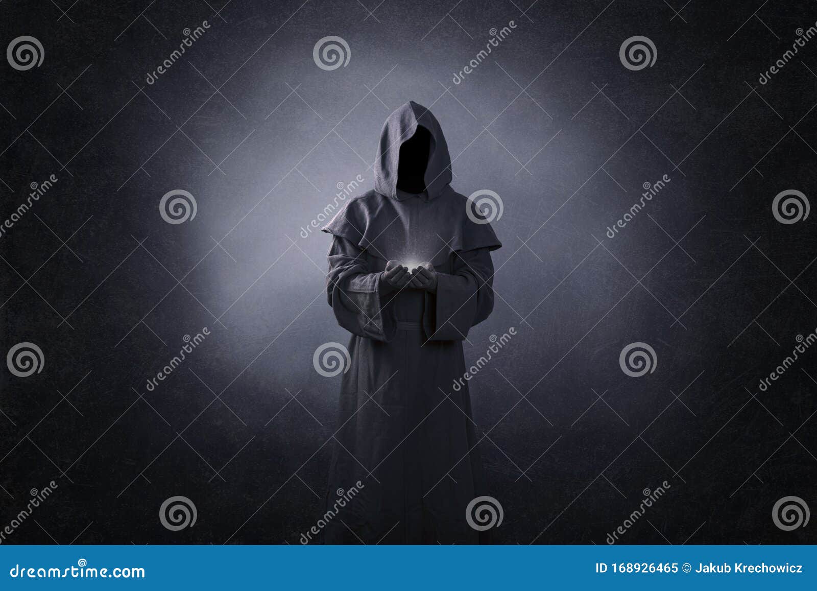 Ghostly Figure with Light in Hands Stock Image - Image of creepy, cloak ...