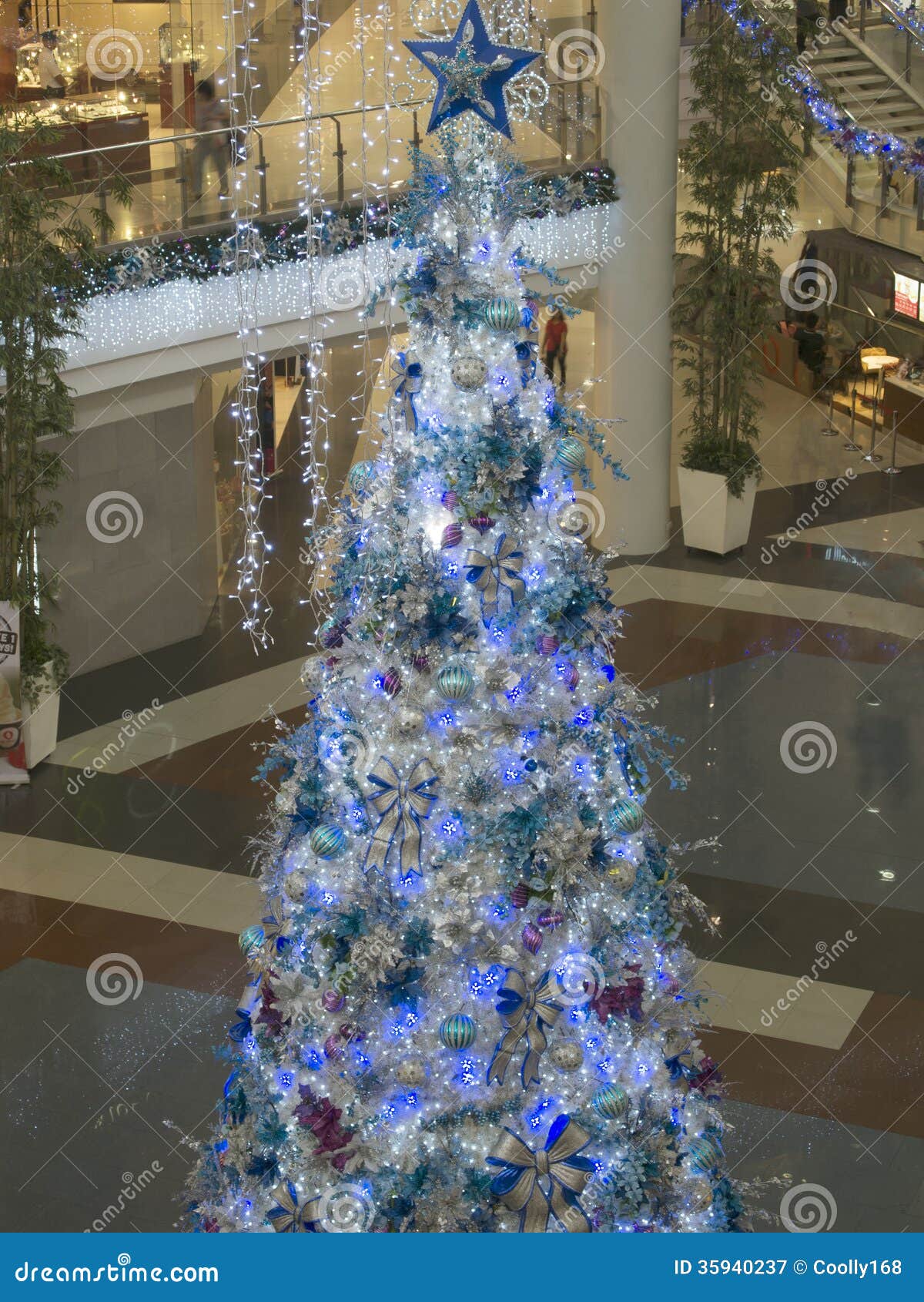 Giant blue christmas tree stock image. Image of lights - 35940237