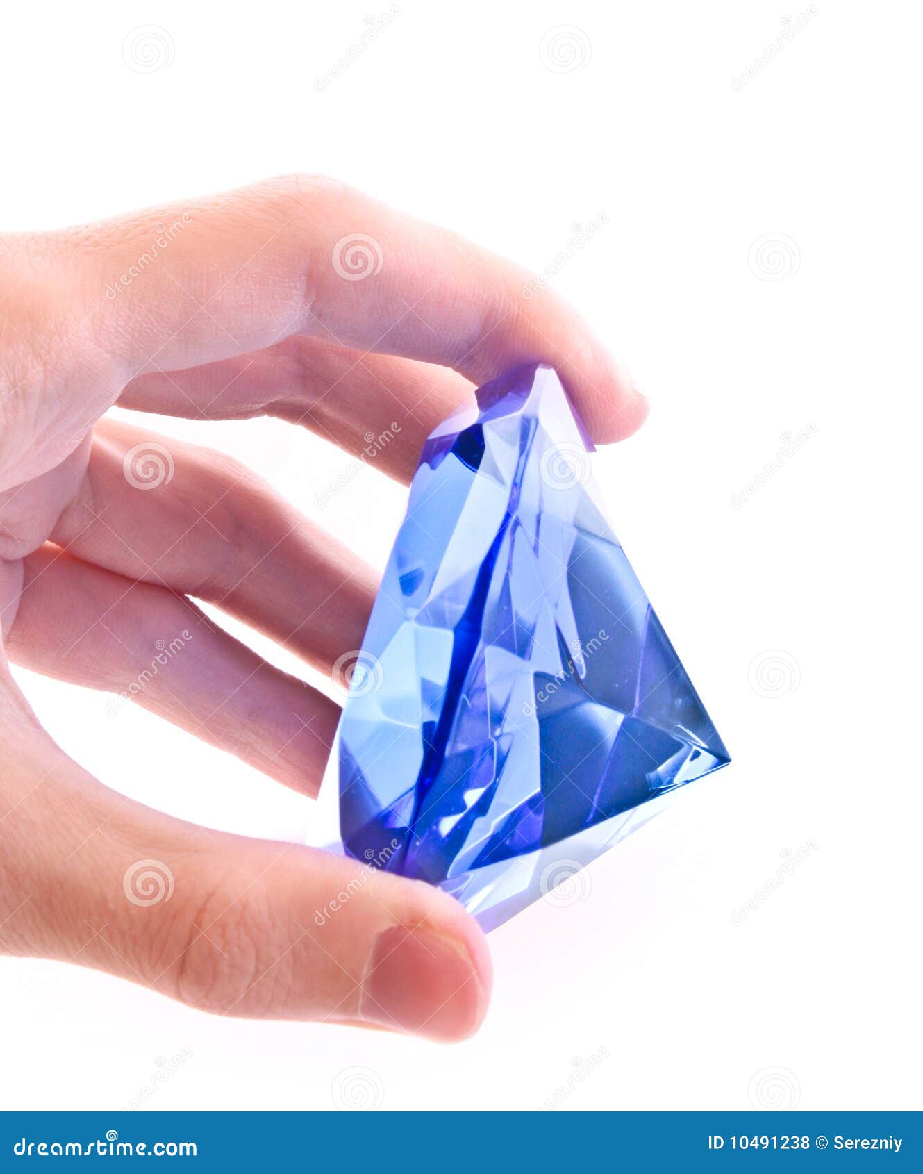 Giant blue diamond in hand stock photo. Image of stone - 10491238