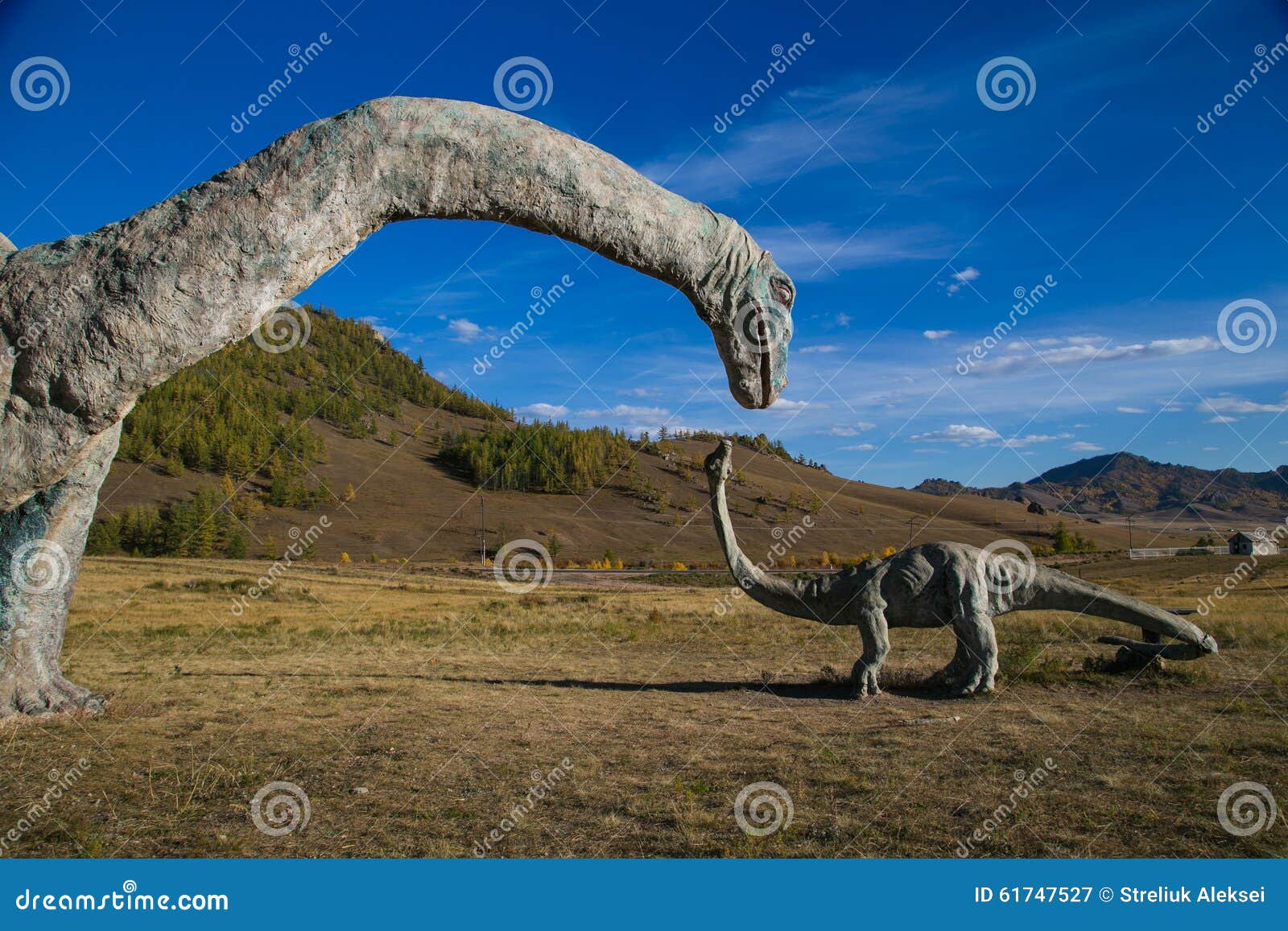 Giant Dinosaur Feeding Her Baby Stock Image - Image of sculpture, great ...