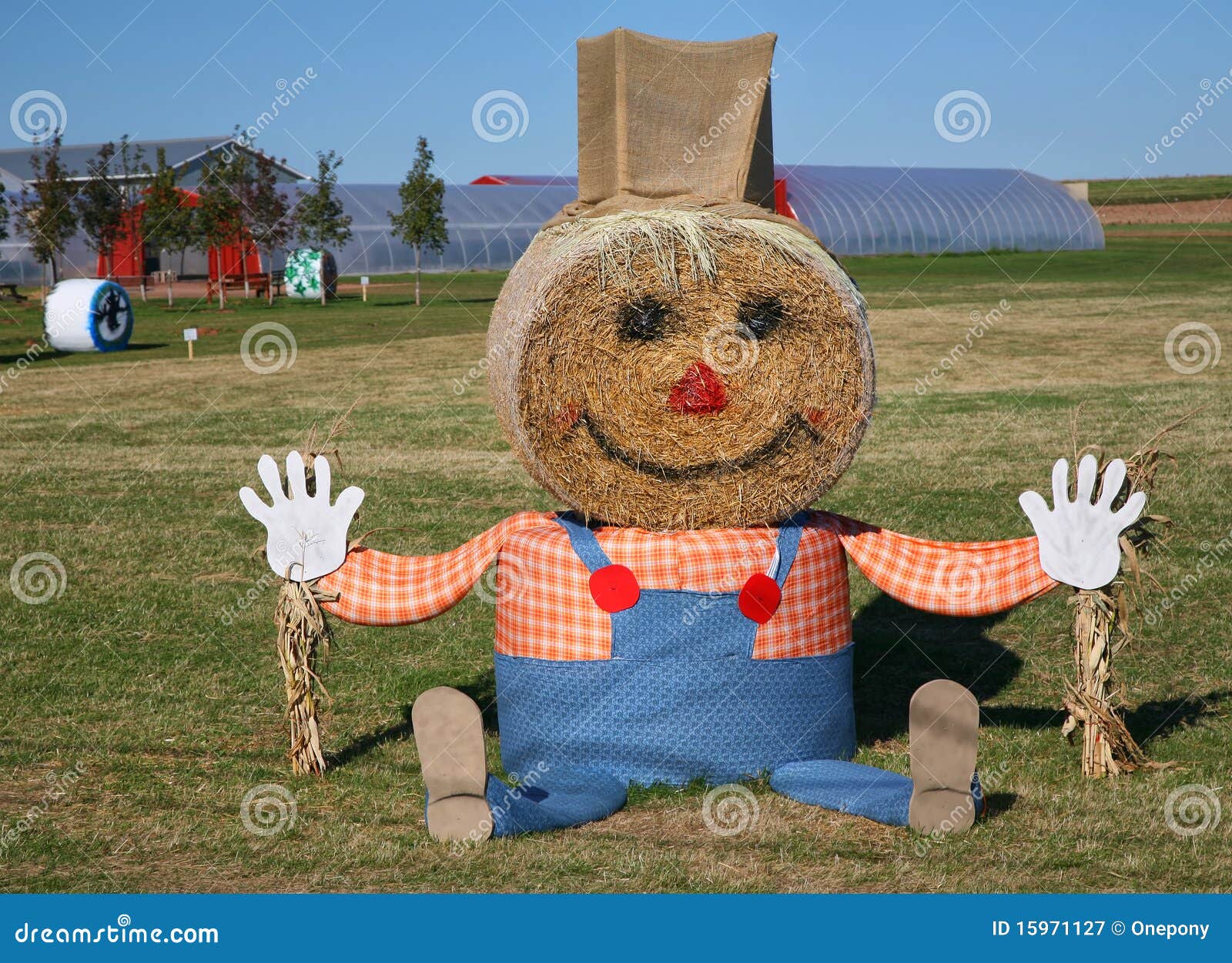 Giant Halloween Scarecrow stock image. Image of bales - 15971127