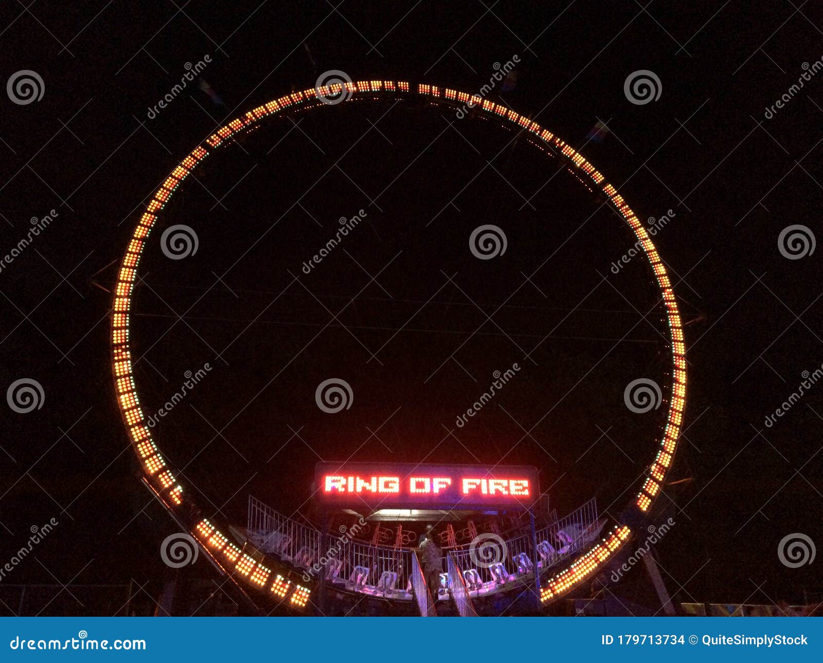 Giant Loop Ride at Fairgrounds at Night Stock Photo - Image of dusk ...