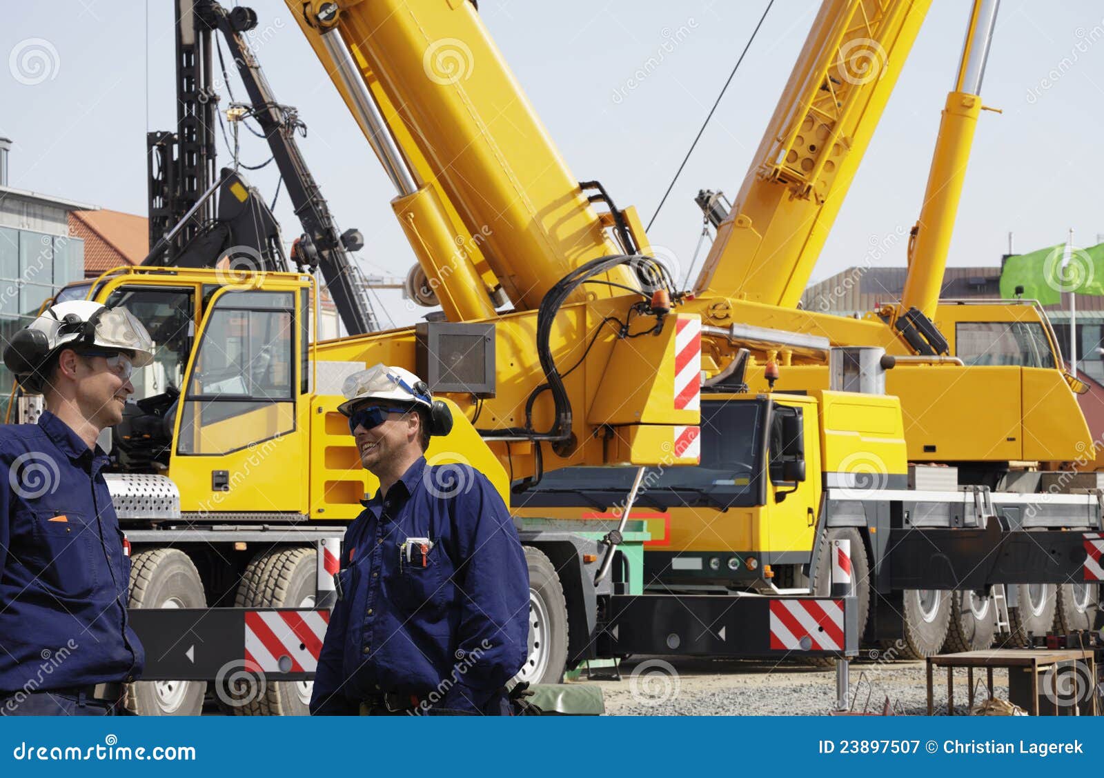 Giant Mobile Cranes and Building Workers Stock Image - Image of hardhat ...