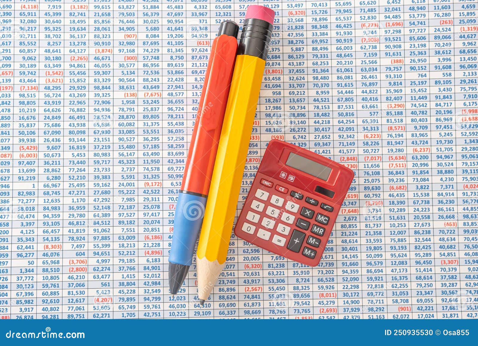 Giant Pencil and Pen with Calculator on Spreadsheet Stock Photo - Image ...