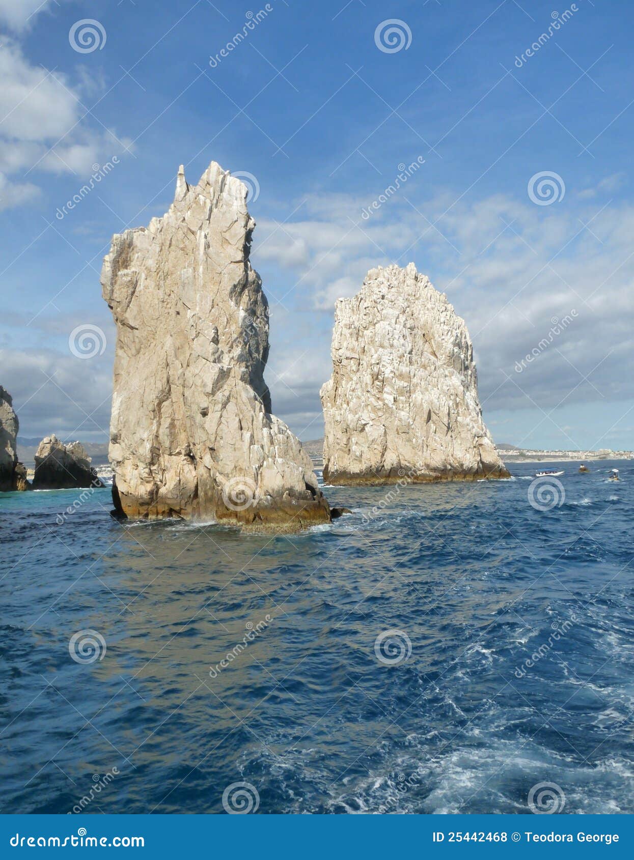 Giant Rocks in the ocean stock photo. Image of visit - 25442468
