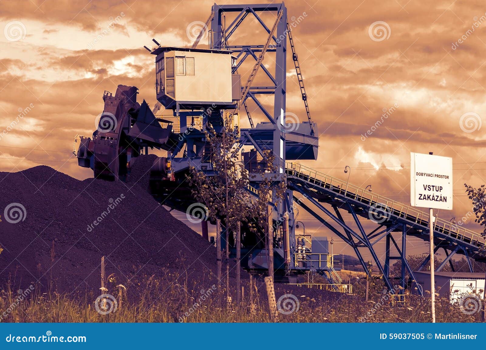 A Giant Wheel Excavator in Brown Coal Mine in the Sunset Stock Image ...