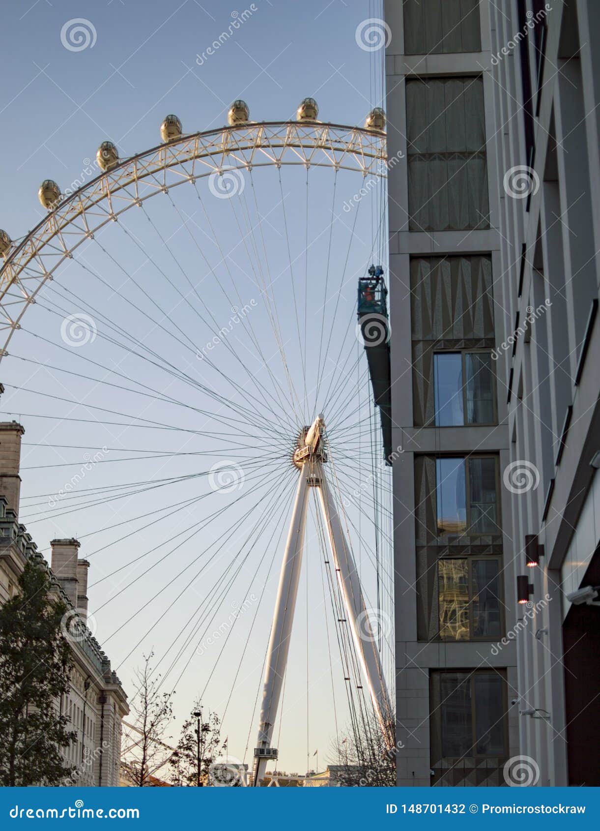 The Giant Wheel of London Eye and a Building on the Sides Editorial ...