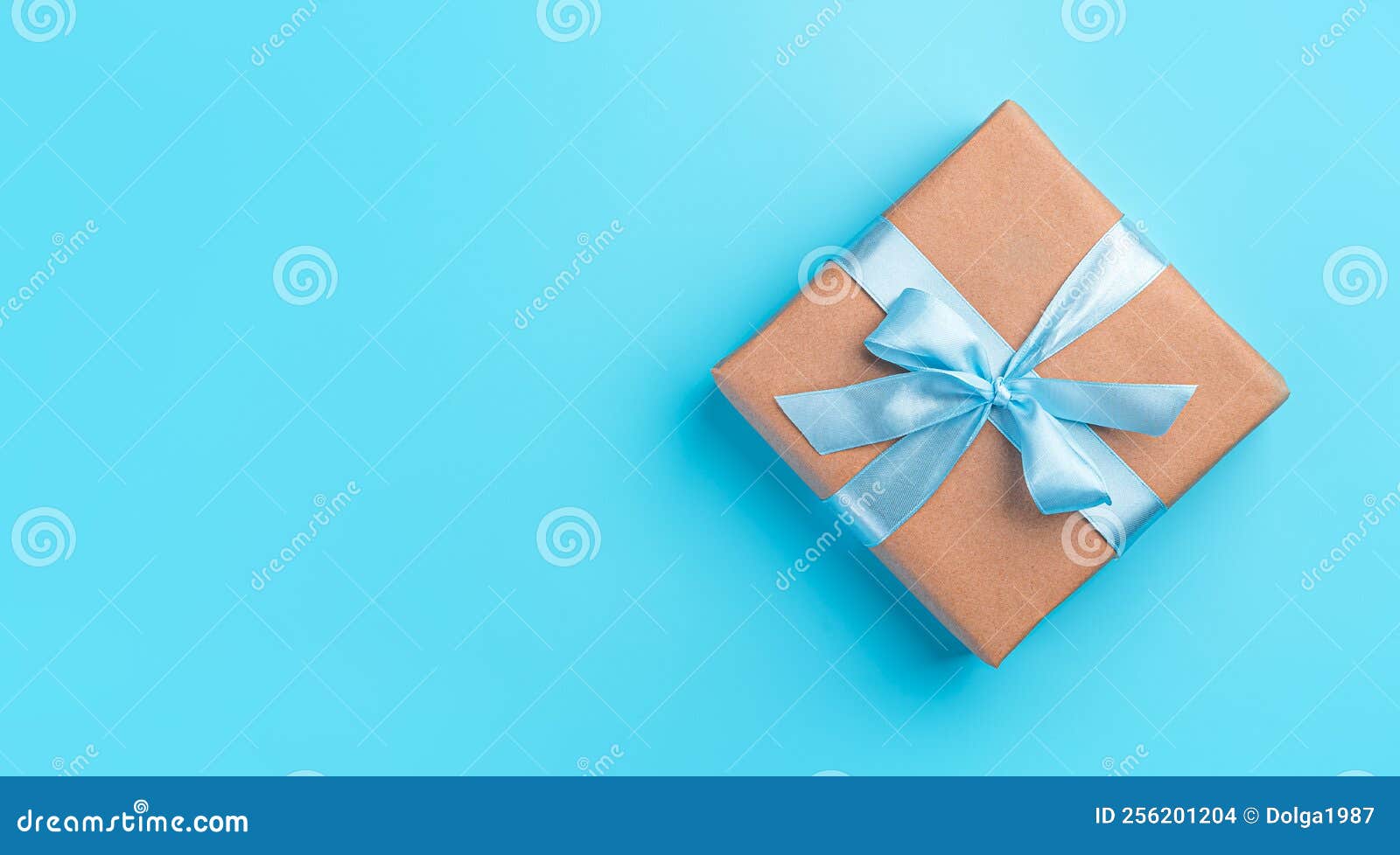 Gift Box with a Blue Ribbon on a Blue Background. the Concept of ...
