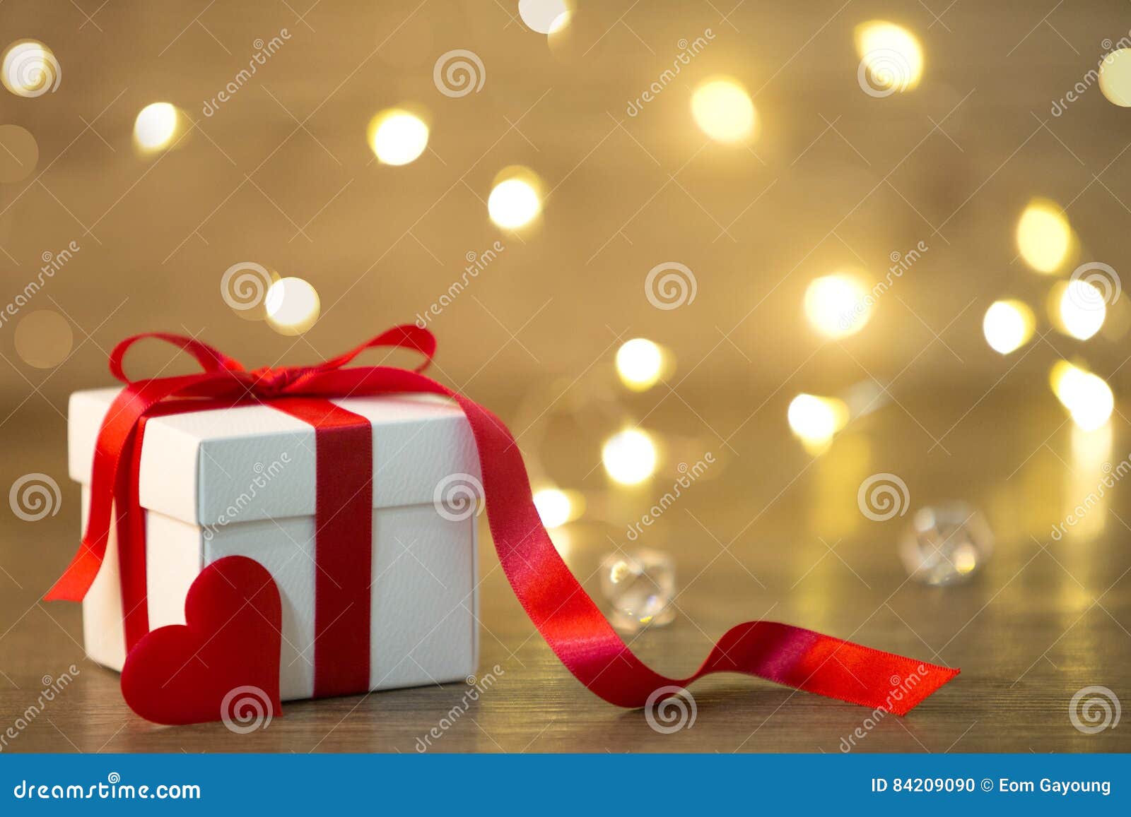 Gift Box on the Boke. Red Ribbon. Valentines Day Gift Box. Defocus. Stock Photo - Image of ...