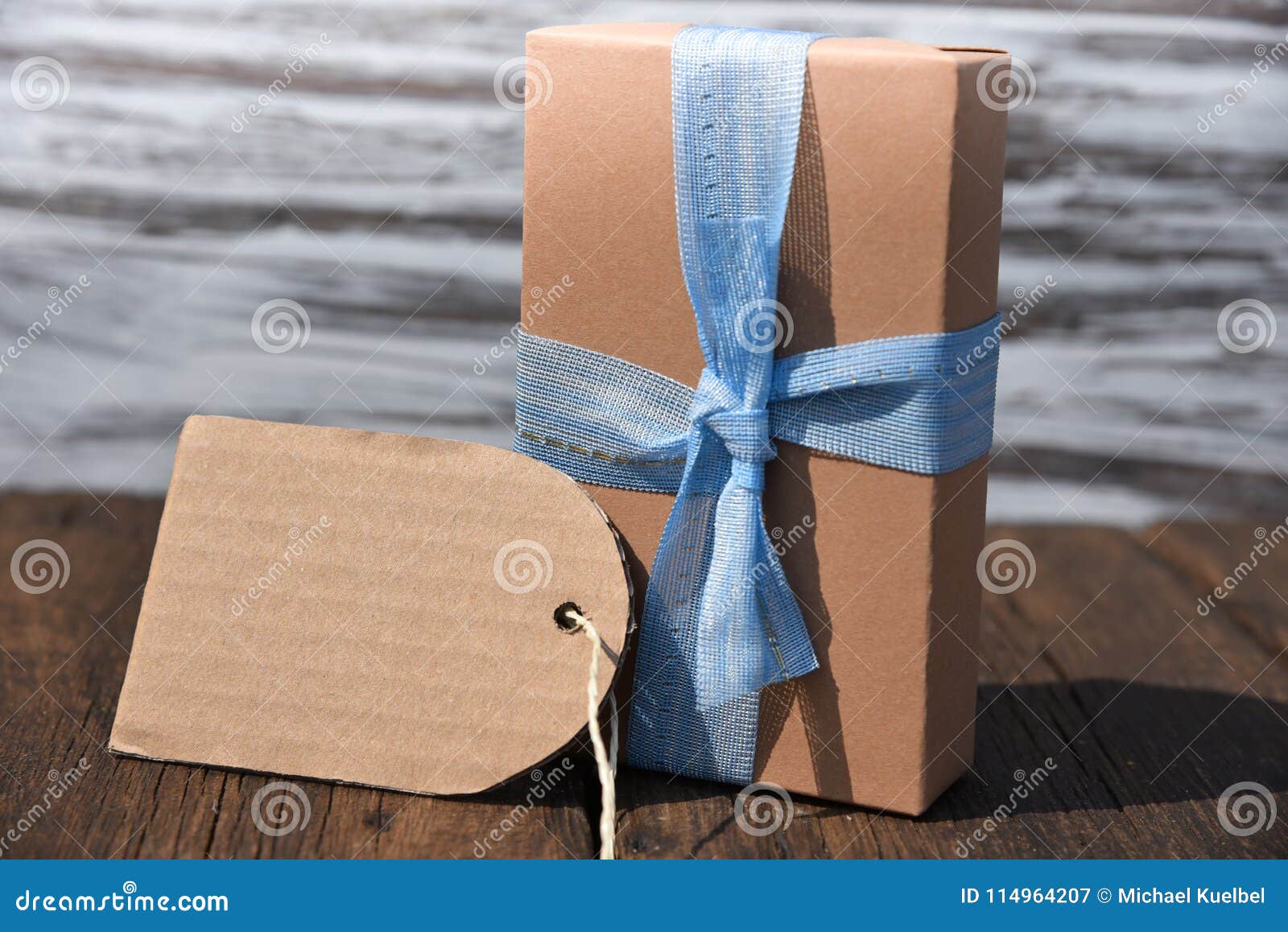 Gift Box with Bow on Wood Table Front View Stock Image - Image of gift ...