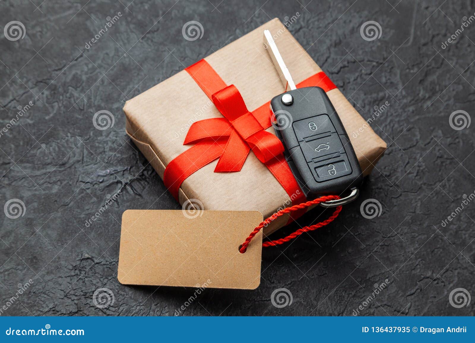 Gift Box with Car Keys with Remote Control Alarm System with Red Ribbon ...