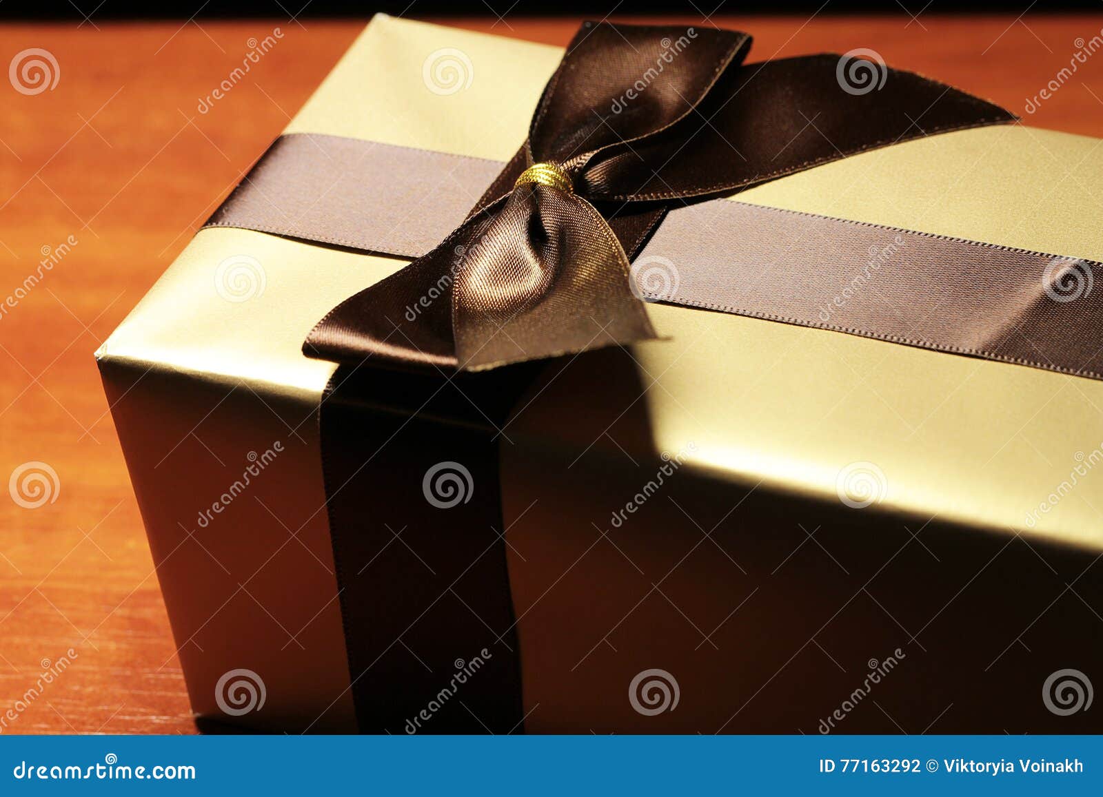 Gift box of golden color stock photo. Image of father - 77163292