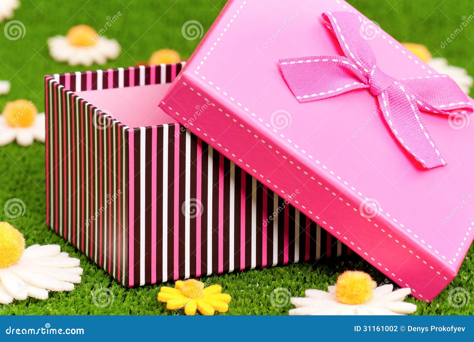Gift box on grass stock photo. Image of holiday, grassy - 31161002